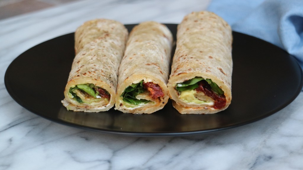 Norwegian flatbread (Lefse) with avocado, sun-dried tomatoes and ...