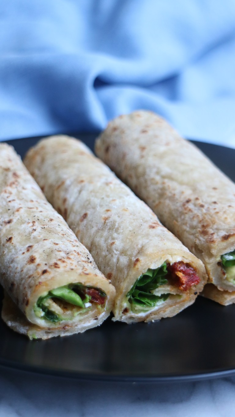 Norwegian flatbread (Lefse) with avocado, sun-dried tomatoes and ...