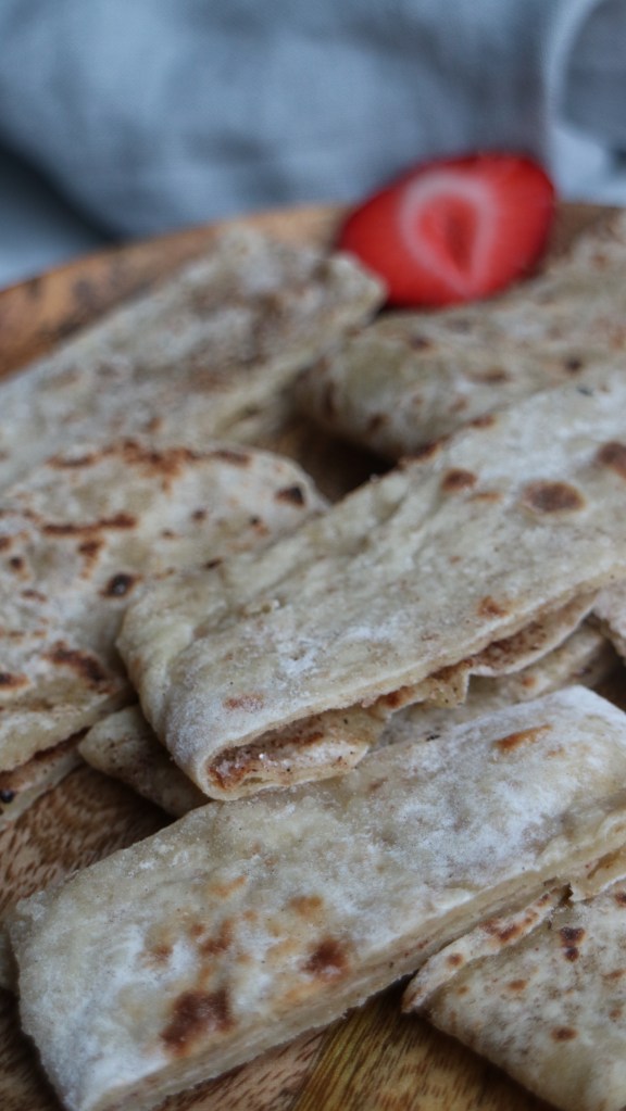 Norwegian flatbread (Lefse) with avocado, sun-dried tomatoes and ...