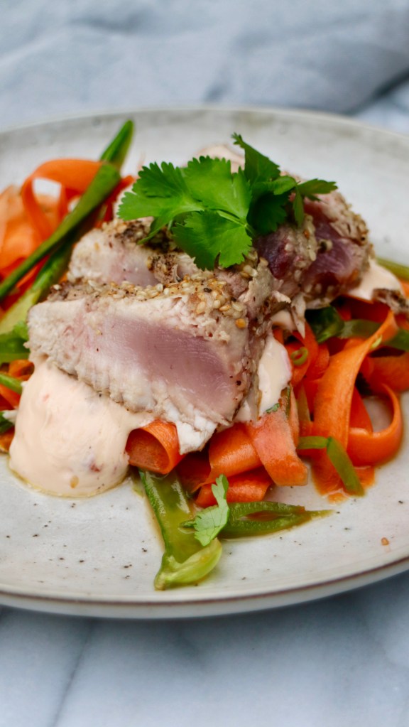 Sesame and black pepper grilled tuna with vegetables and chili sauce ...