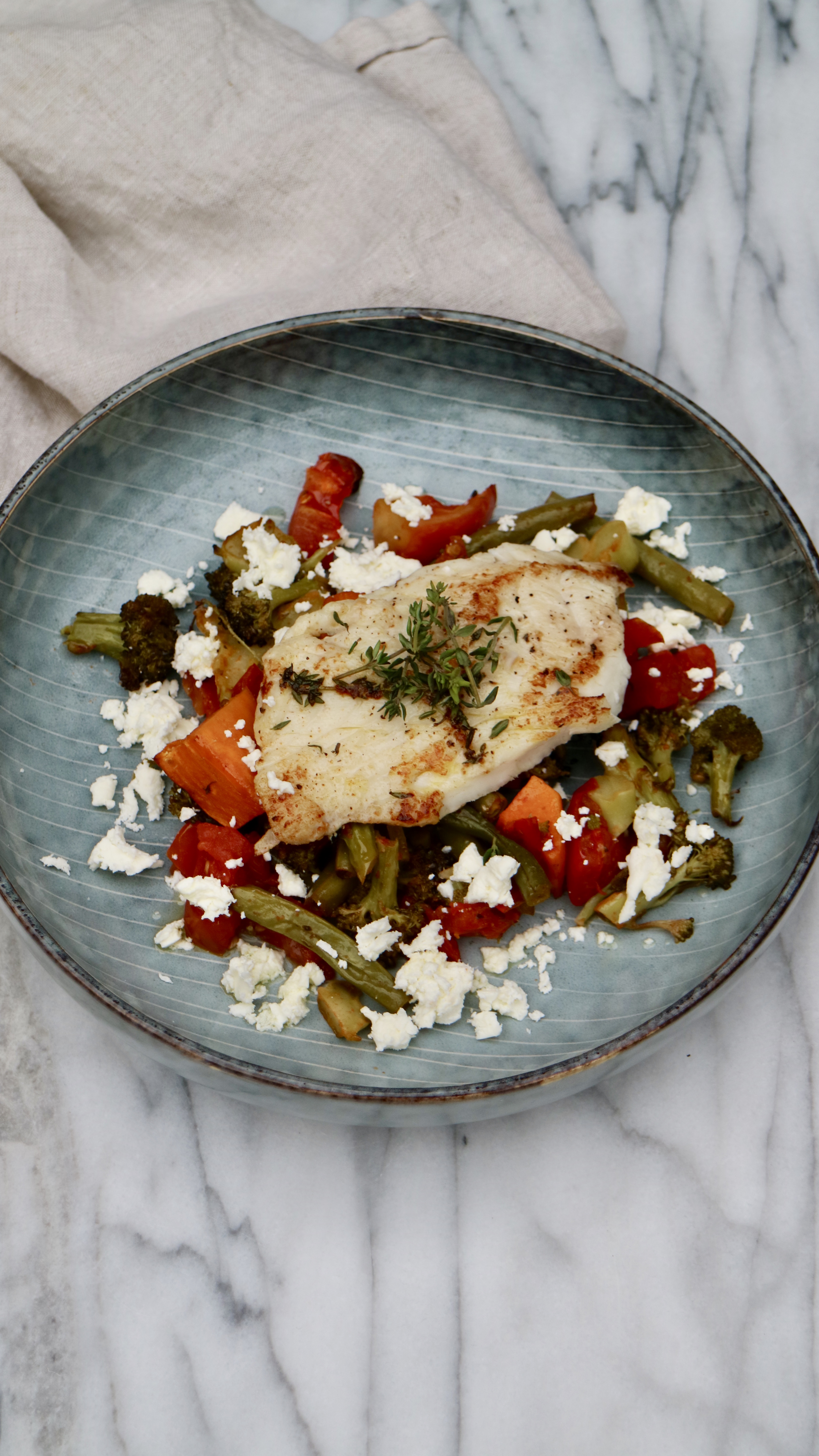 Fried Sheepshead fish on a green and red salad with Feta cheese ...